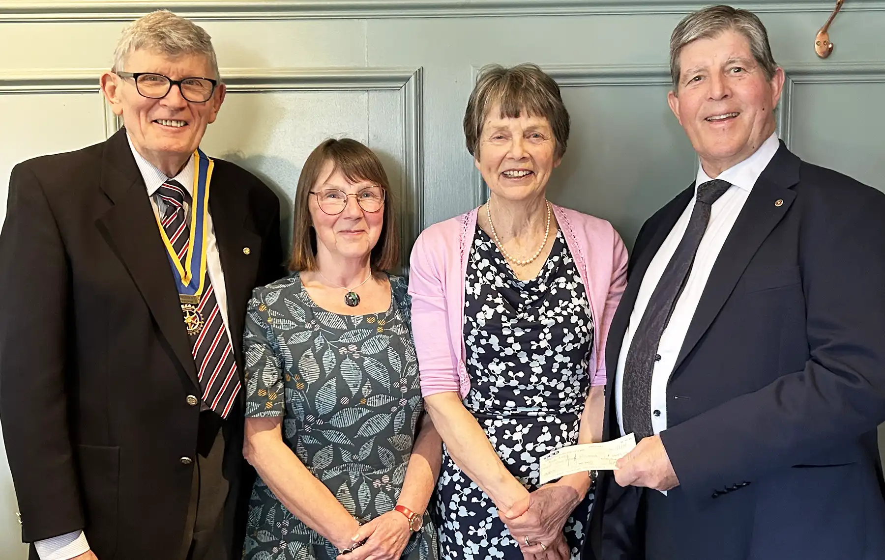 Wimborne Rotary hands over £1,000 to help adults with reading ...