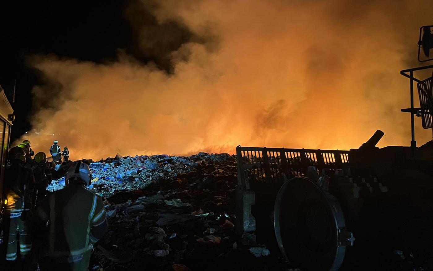 Fire crews battle through the night to control landfill blaze near ...